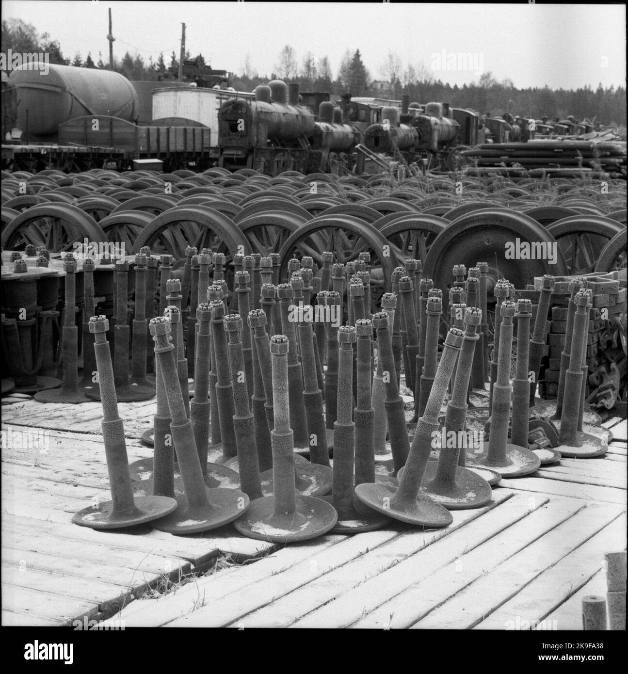 Steam locomotive, trolley wheel and 98 buffers etc. on Vislanda scrap ...