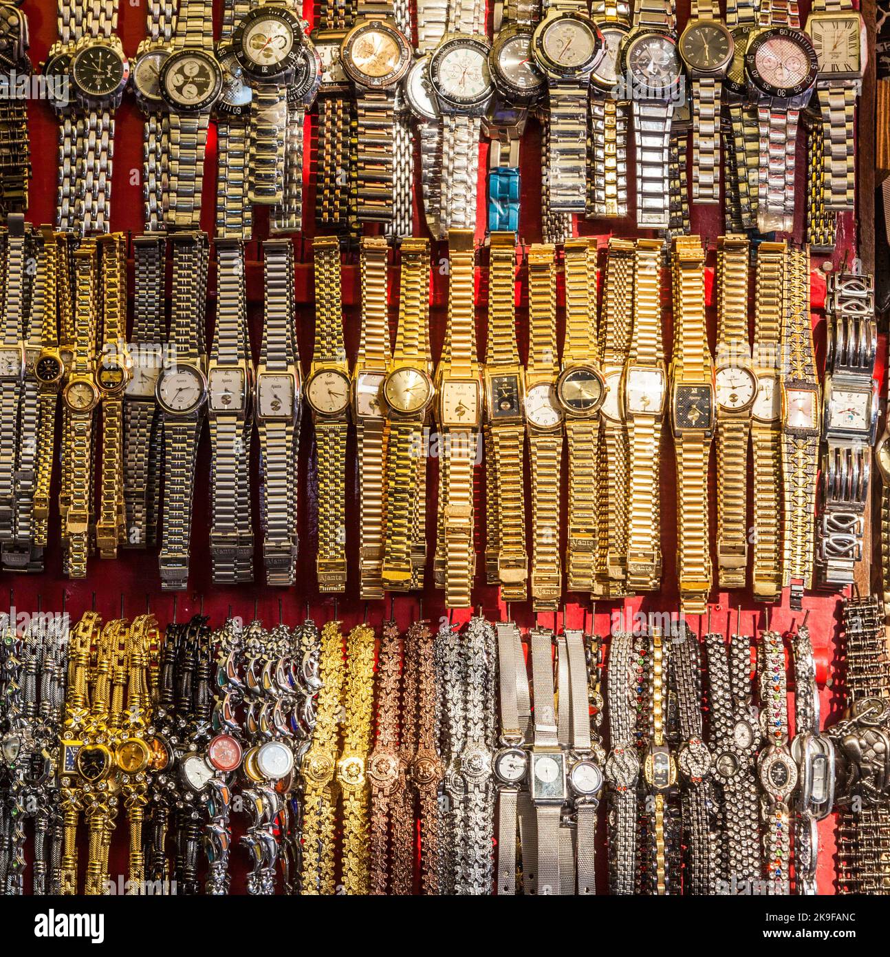 DELHI, INDIA - NOV 10, 2011: golden looking watches at the Meena Bazaar ...
