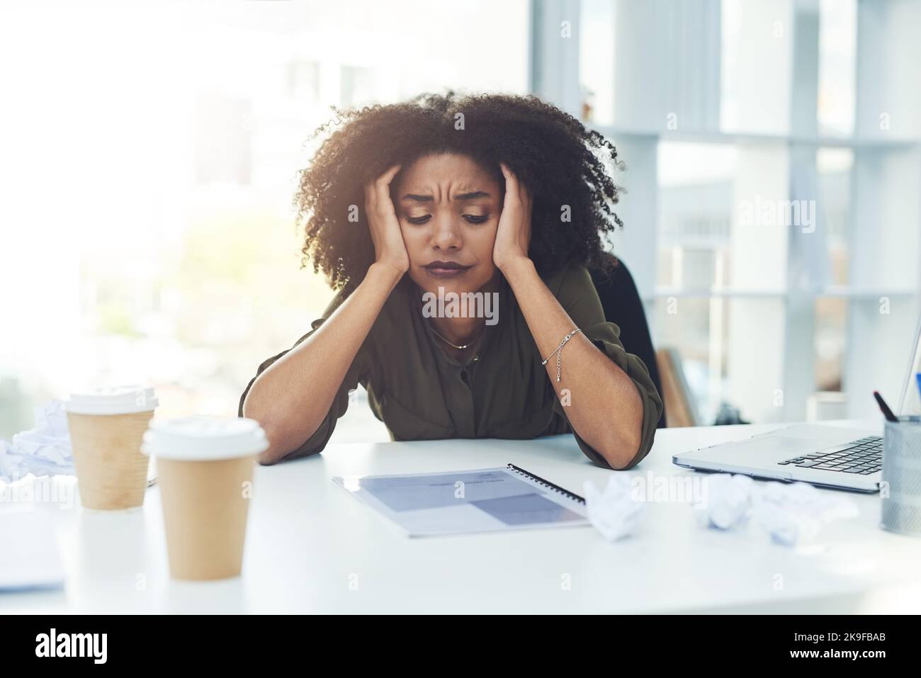 When you cant figure it out, call us for help. a young businesswoman ...