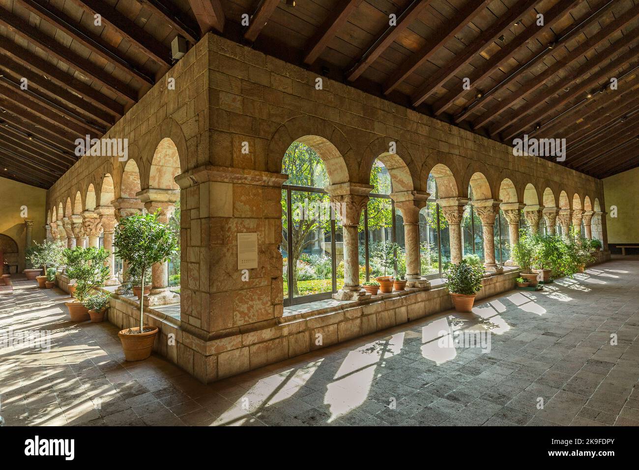 NEW YORK, USA - OCT 22, 2015: Colonnade and garden at The Cloisters ...