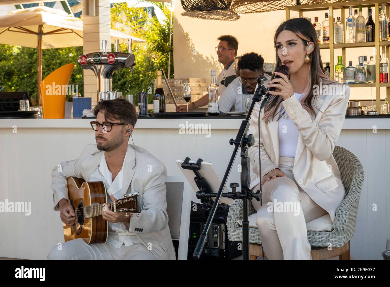 QUINTA DO LAGO, PORTUGAL - 26th JUNE 2022: Band duo singer and guitar ...