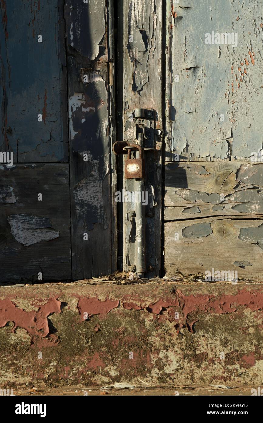 Old lock, latch, door, peeling paint, artistic grunge, illustration, derelict, abandon, concept ...