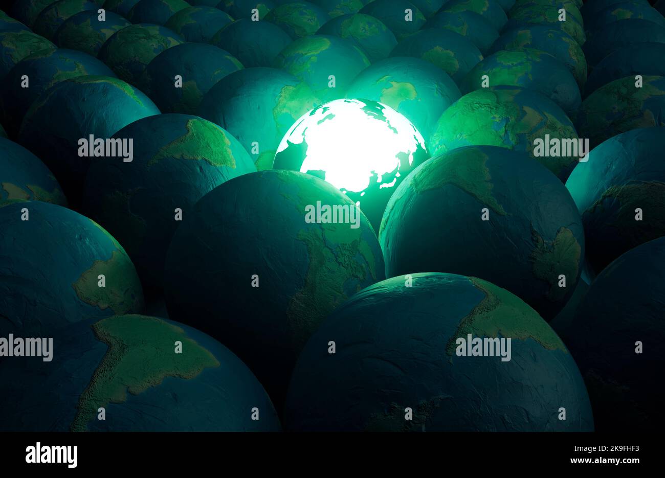 An illuminated neon florescent earth globe amongst a collection of dull earth globes made of ...