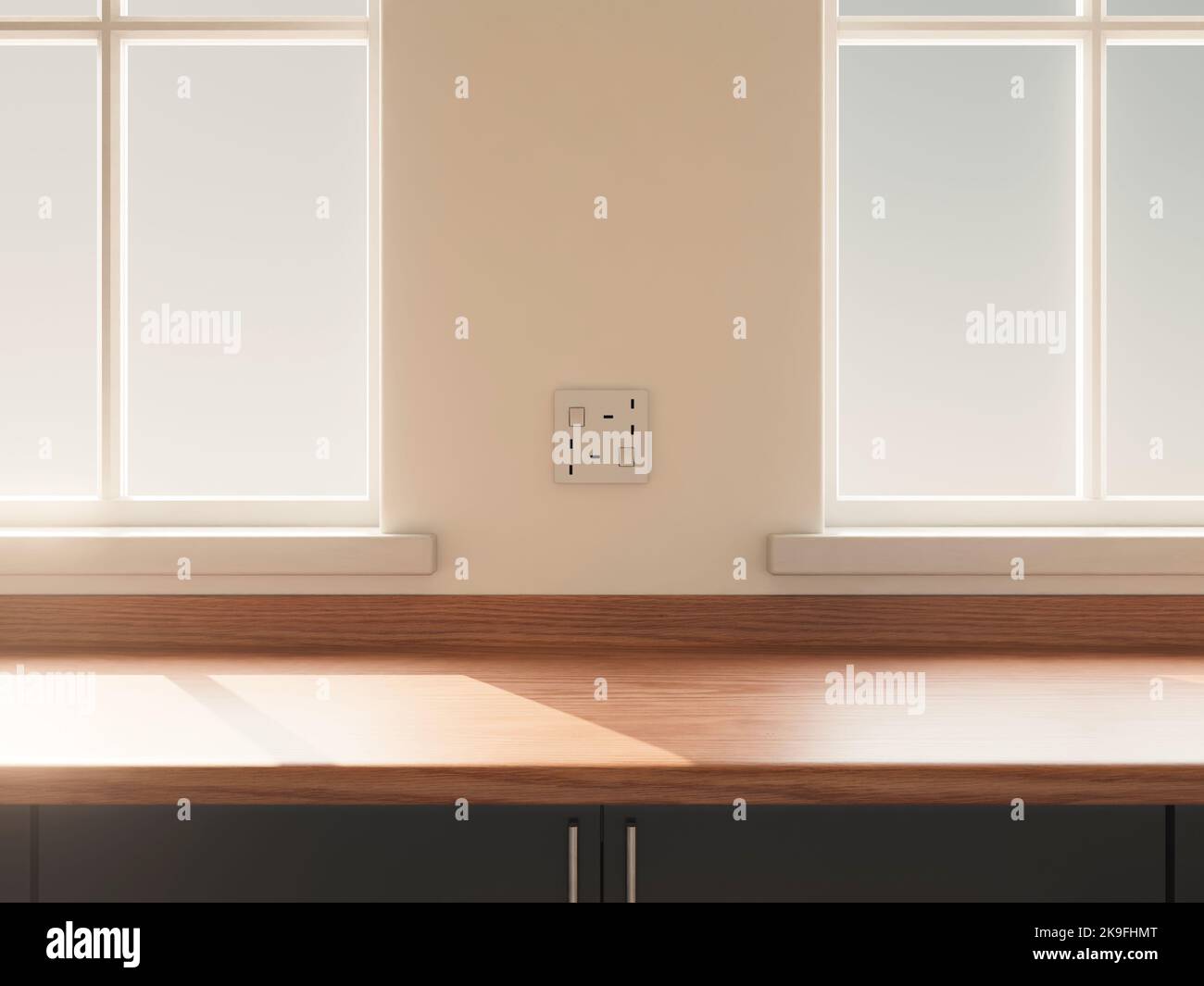 A closeup view of an empty wooden kitchen countertop facing two windows ...