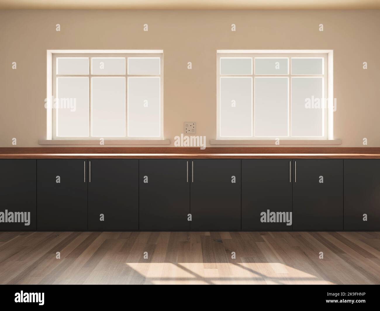 A closeup view of an empty wooden kitchen countertop facing two windows ...