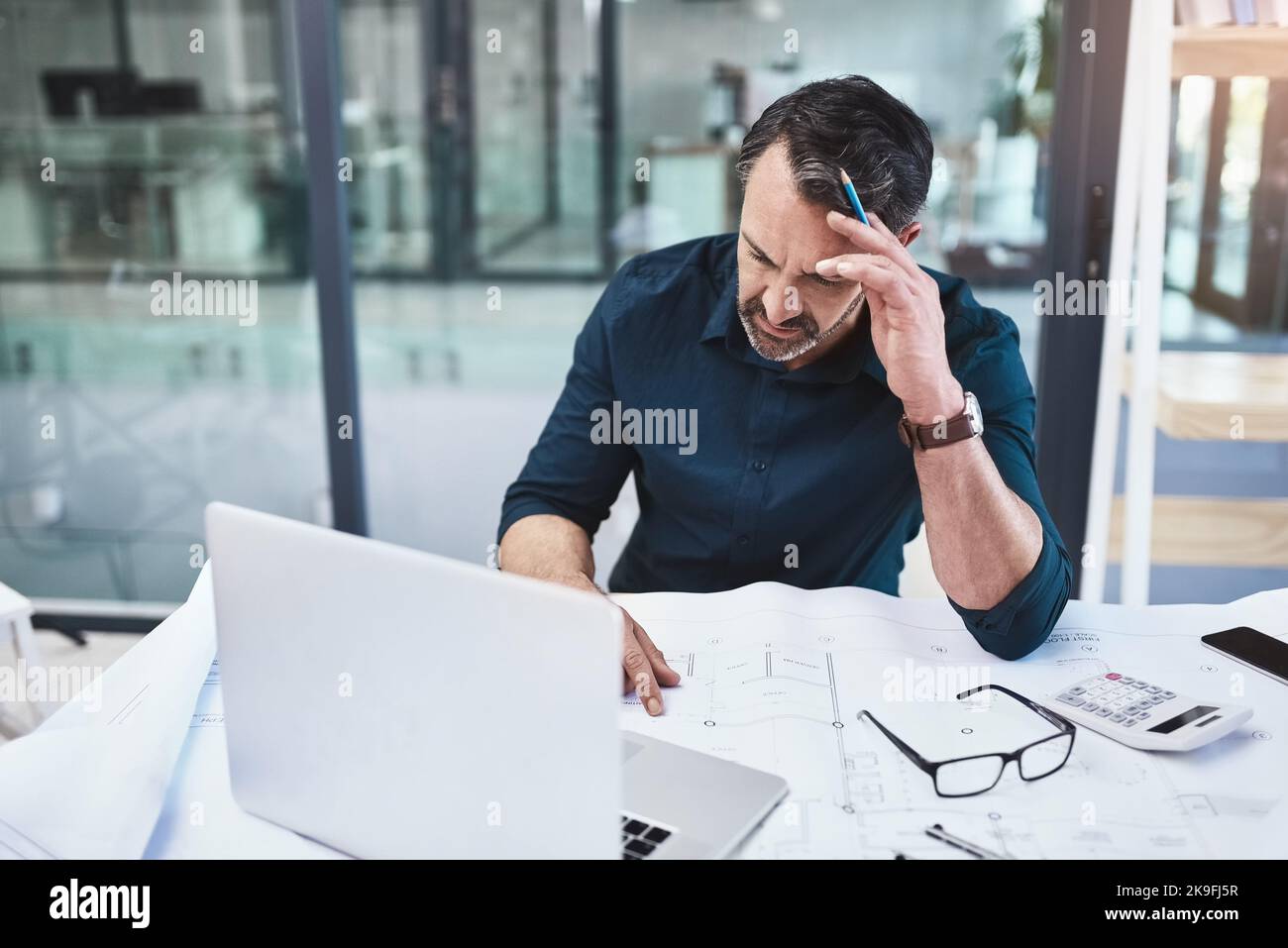 Theres a unique mind inside the head of an architect. a mature male ...