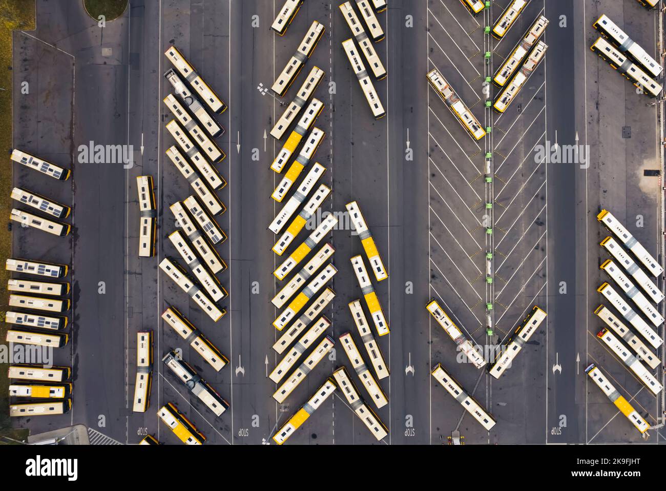 Herringbone pattern made of various buses and coaches standing at a bus ...