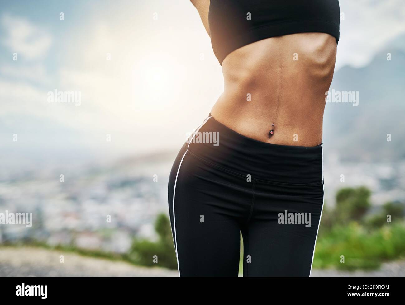 Let a healthier lifestyle lead you to a well-toned body. Closeup shot ...