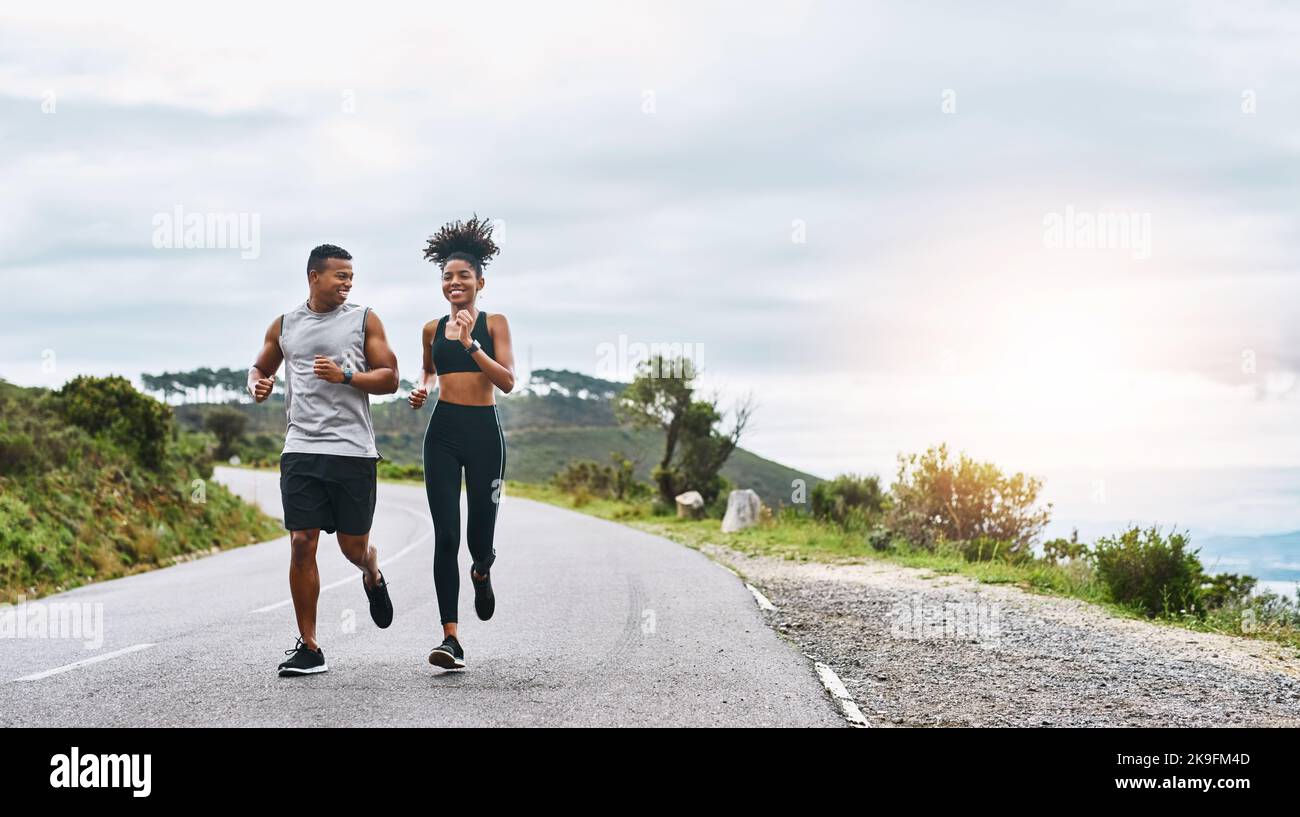 Racing through the journey towards fitness together. a sporty young ...