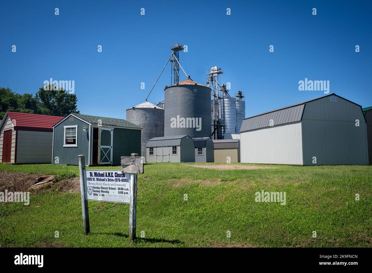 Multiple silo and barns for storage Stock Photo - Alamy
