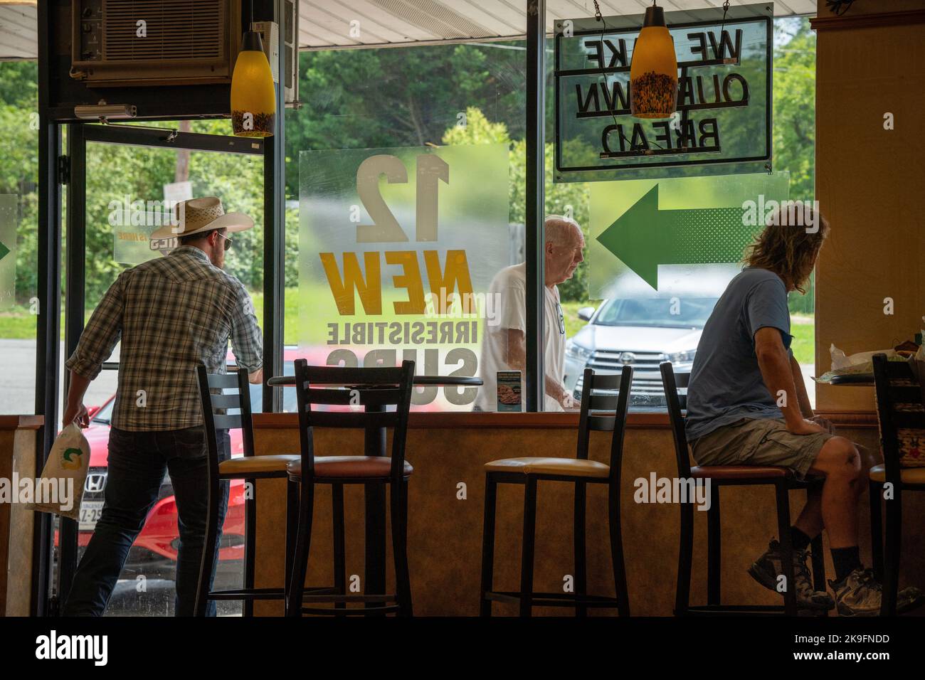 Men visiting the Subway restaurant Stock Photo - Alamy