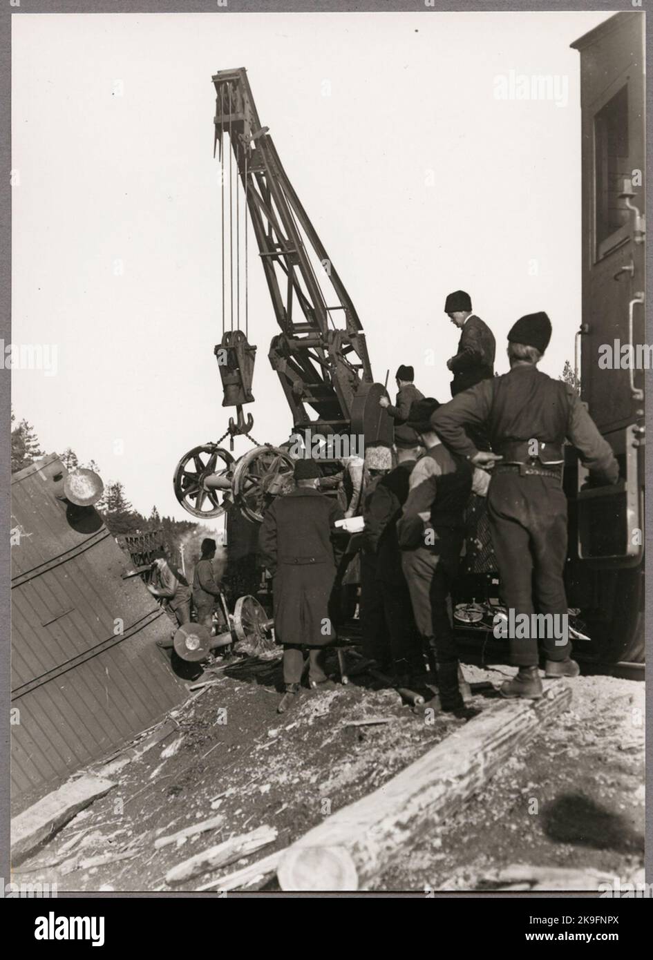 Salvage of freight wagon using the lifting crane after an accident ...