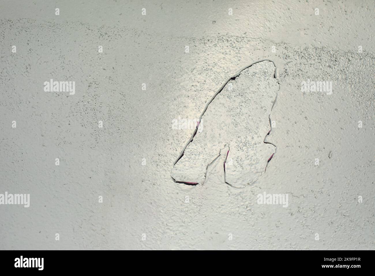 Grey wall. Bad paint. Hole on surface. Crumbling paint Stock Photo - Alamy