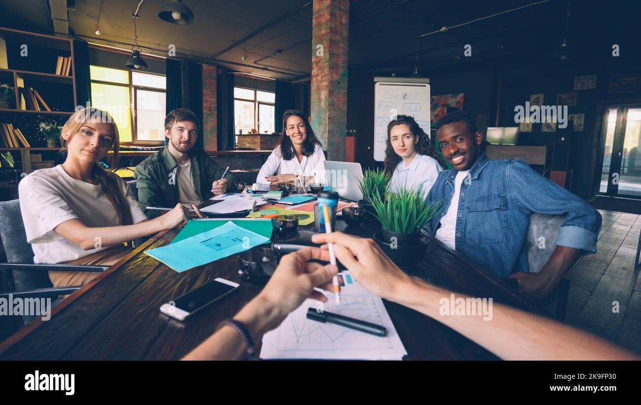 Teamwork in a friendly atmosphere hi-res stock photography and images ...