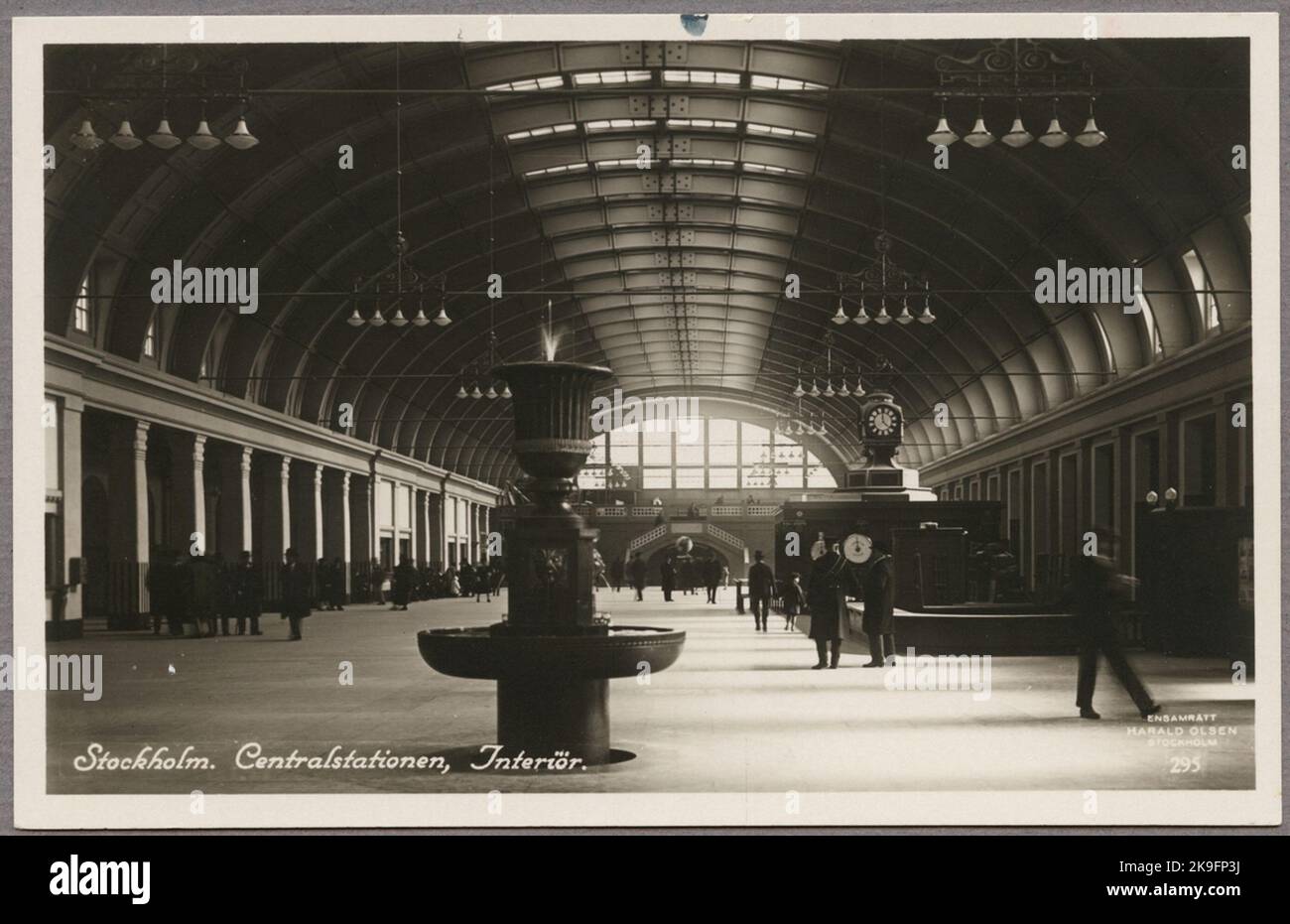Interior of station houses with travelers in the picture Stock Photo ...