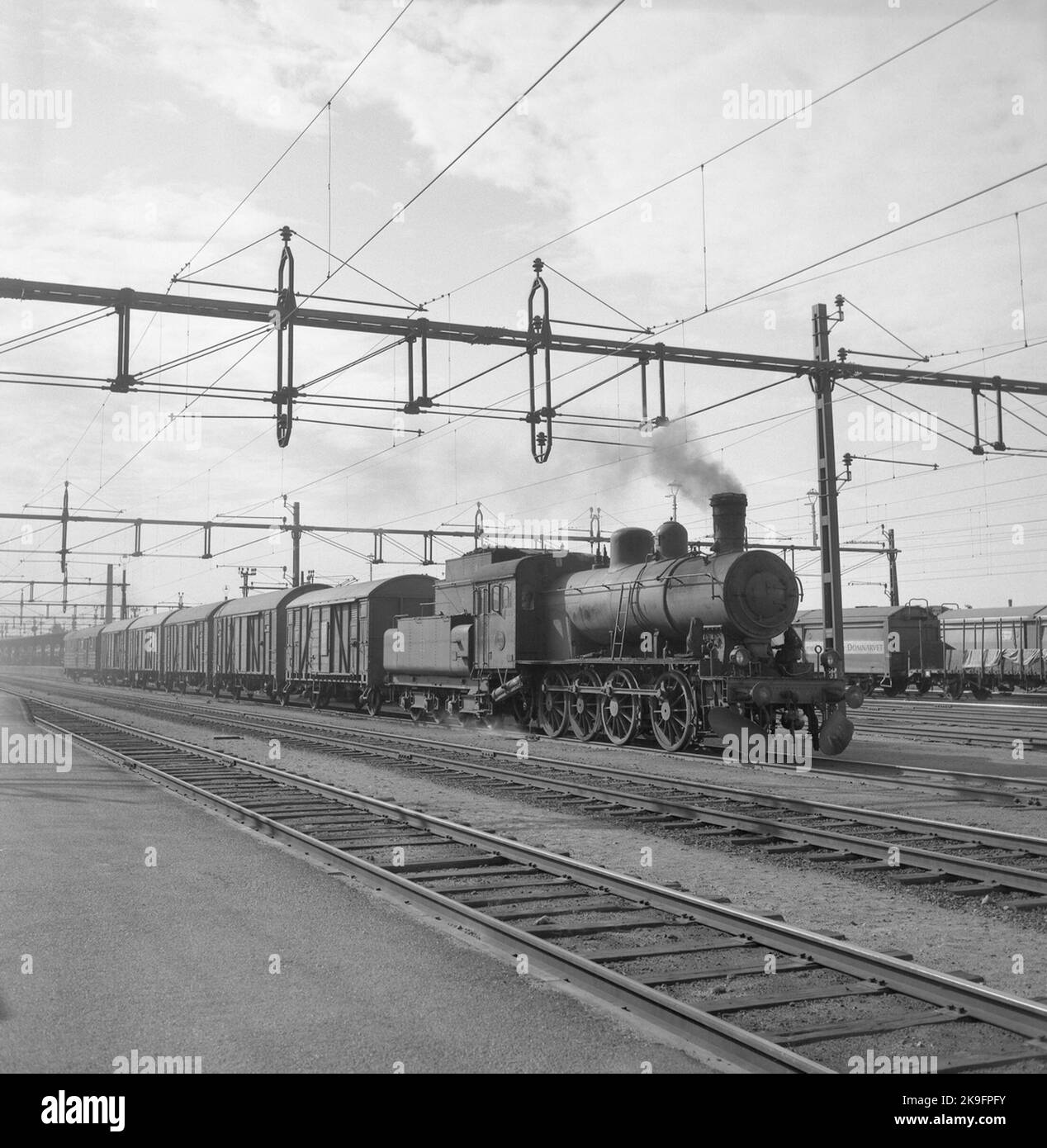 The State Railways, SJ E 1074 with freight trains Stock Photo - Alamy