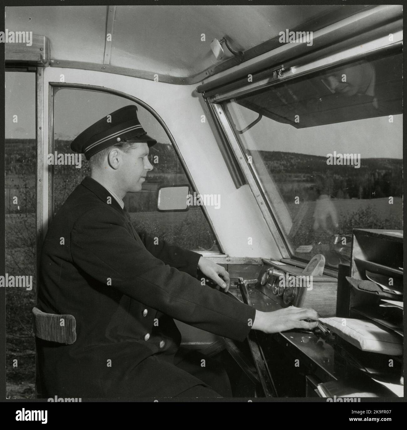 Locomotive driver at his workplace in a rail bus Stock Photo - Alamy