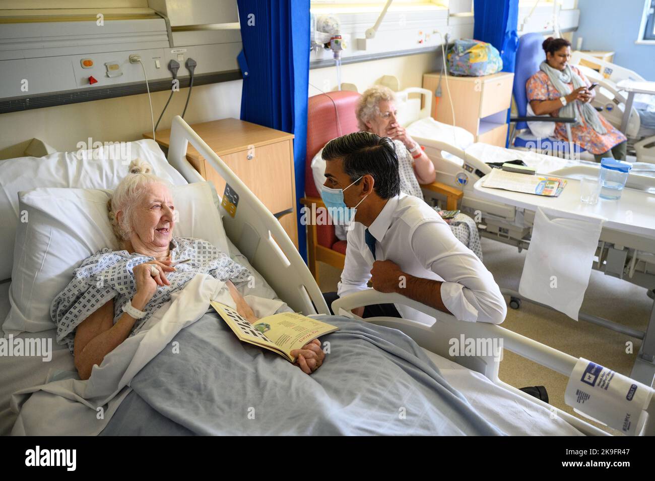 Prime Minister Rishi Sunak speaks with patient Brenda Boyling during a ...