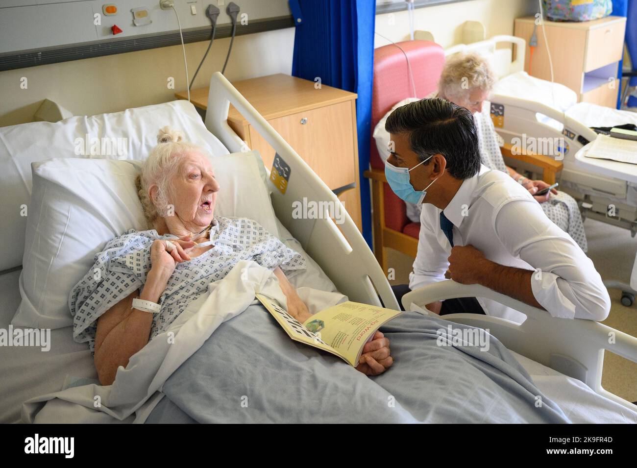 Prime Minister Rishi Sunak speaks with patient Brenda Boyling during a ...