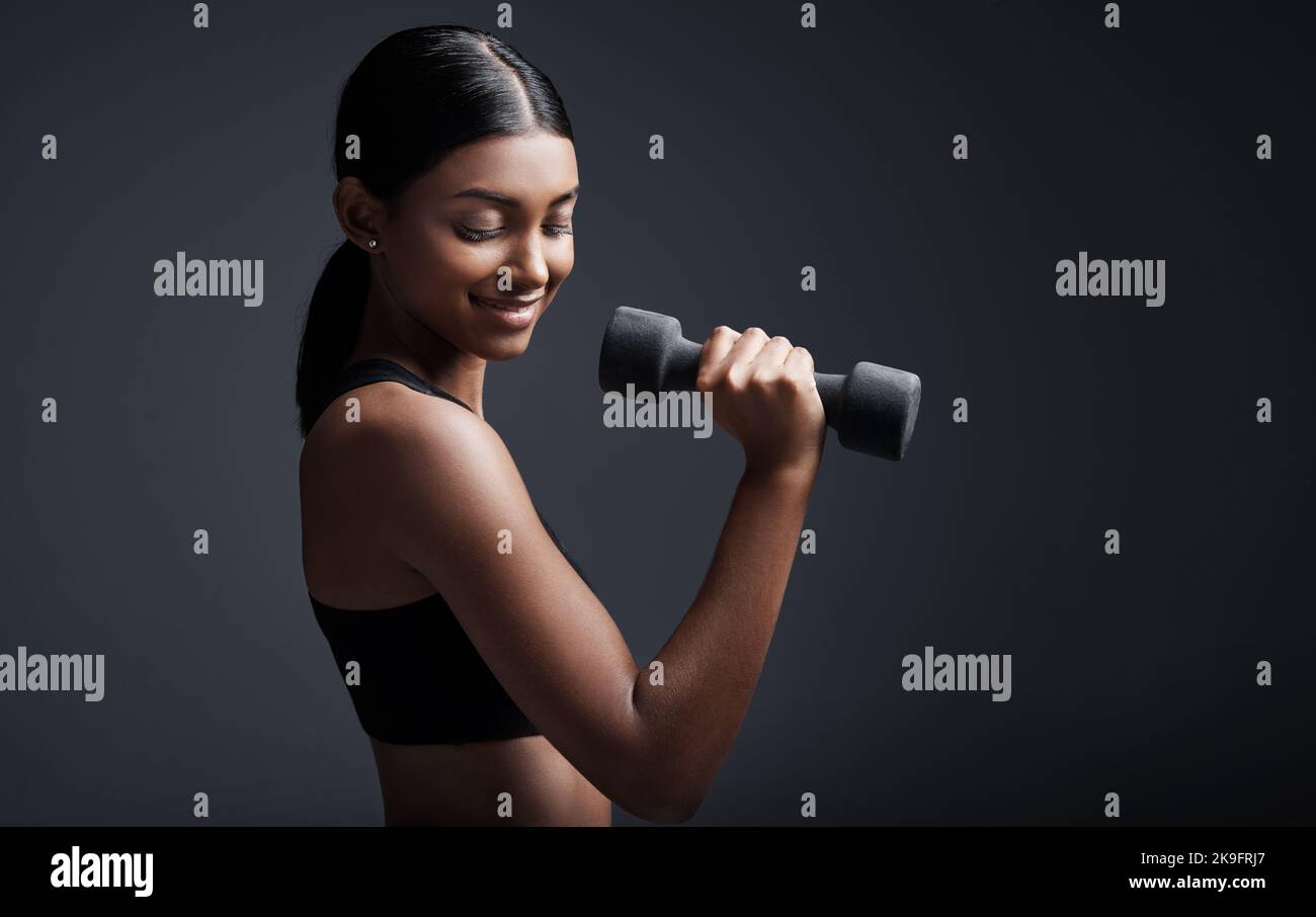 Self confidence is the strongest muscle you can possess. Studio shot of ...