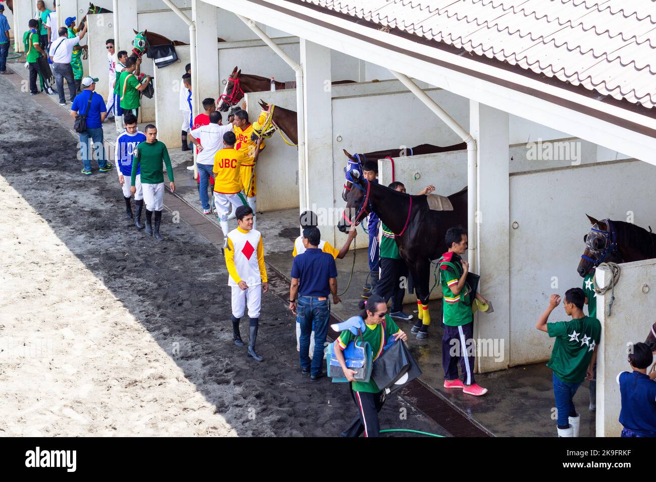 Horse racing at the Metroturf hippodrome in Tanauan, Batangas ...