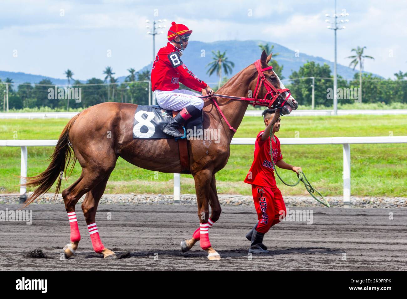 Horse racing at the Metroturf hippodrome in Tanauan, Batangas ...