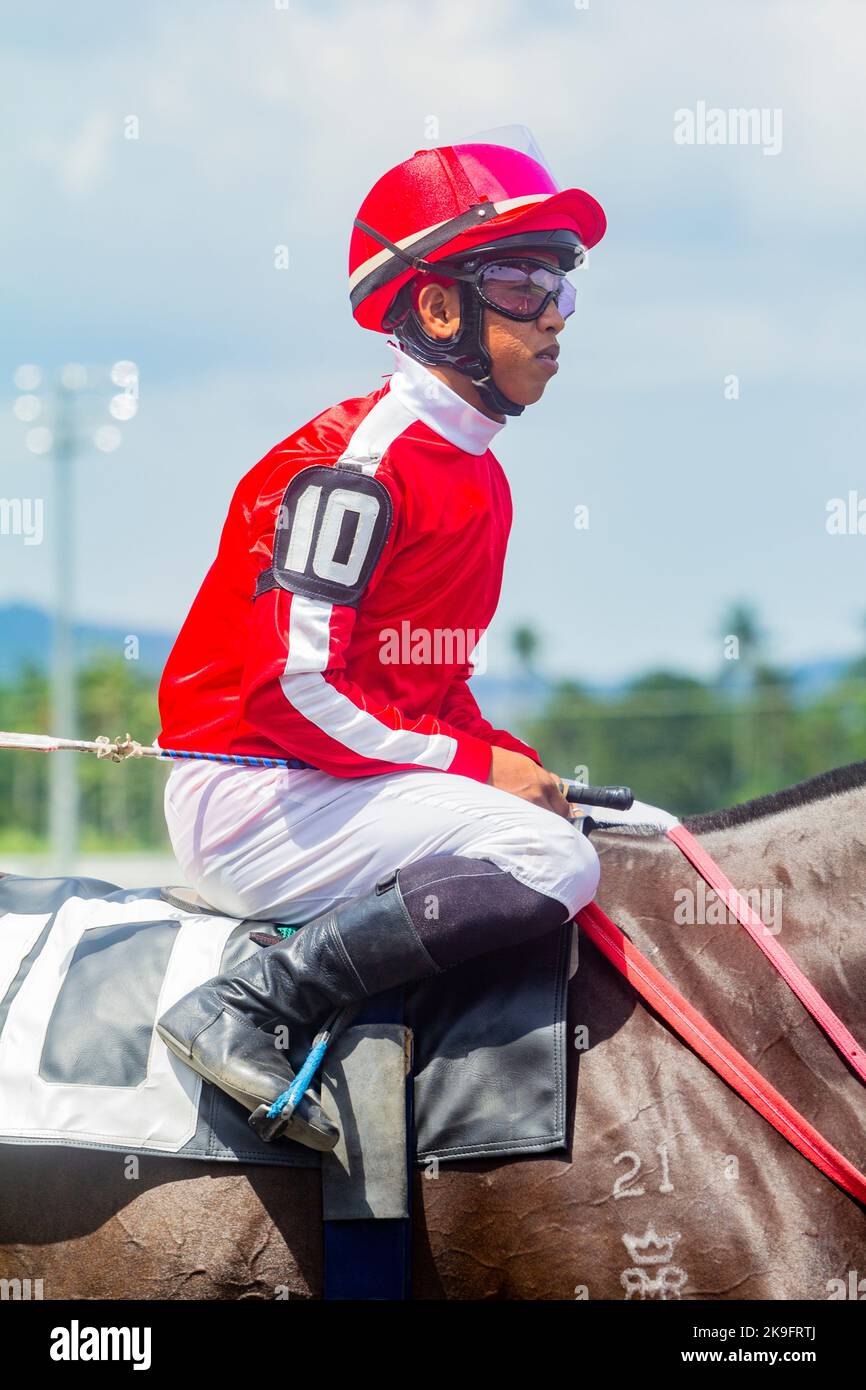 Horse racing at the Metroturf hippodrome in Tanauan, Batangas ...