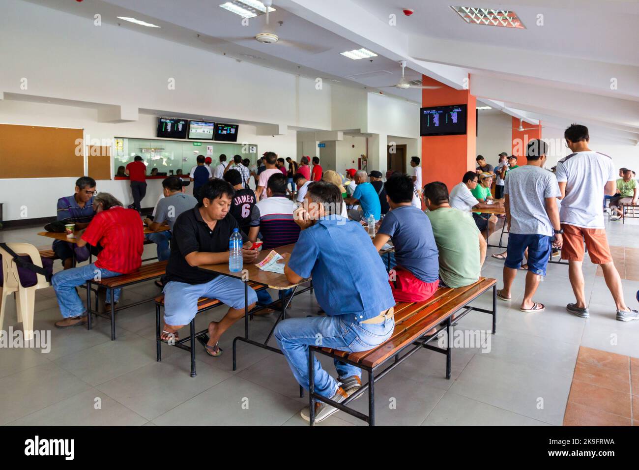 Horse racing at the Metroturf hippodrome in Tanauan, Batangas ...