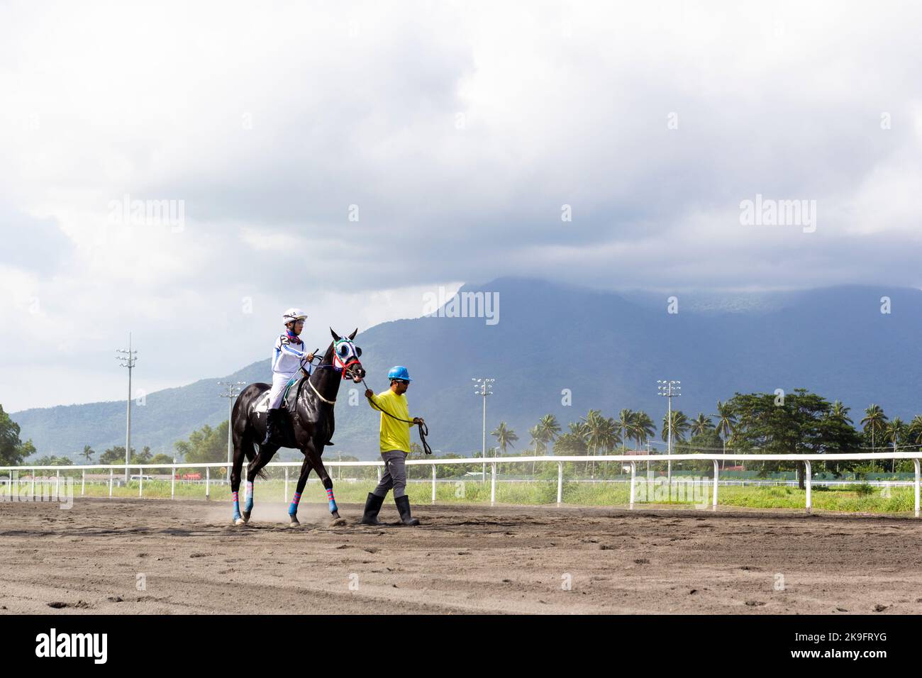 Horse racing at the Metroturf hippodrome in Tanauan, Batangas ...