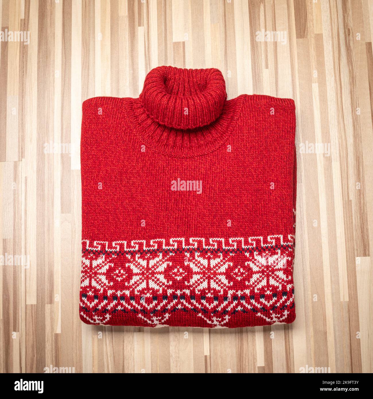 Red knitted Christmas turtleneck pullover of traditional design with ...