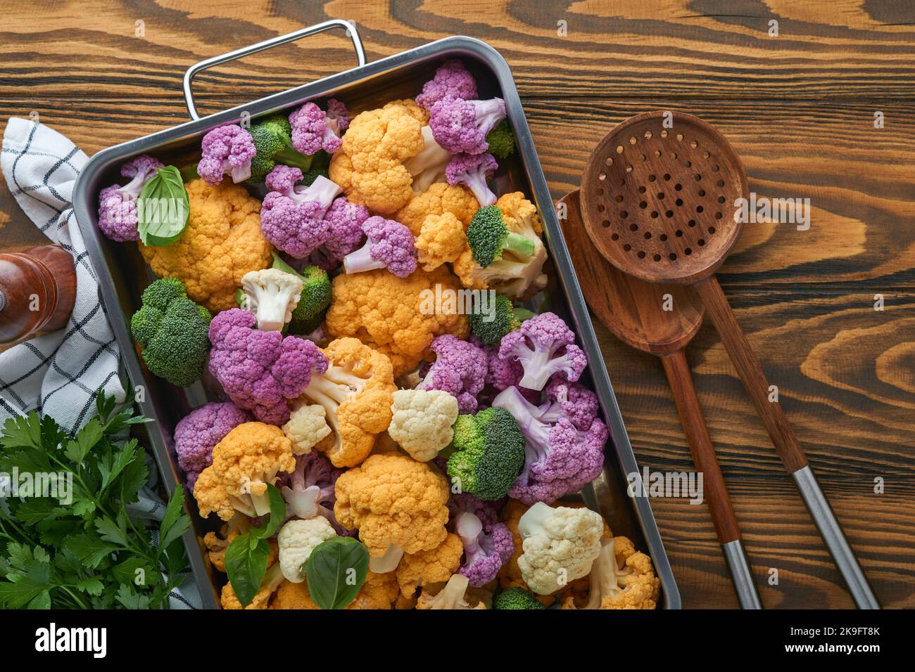 Baked colorful cauliflower. Cut into small pieces baked cauliflower ...