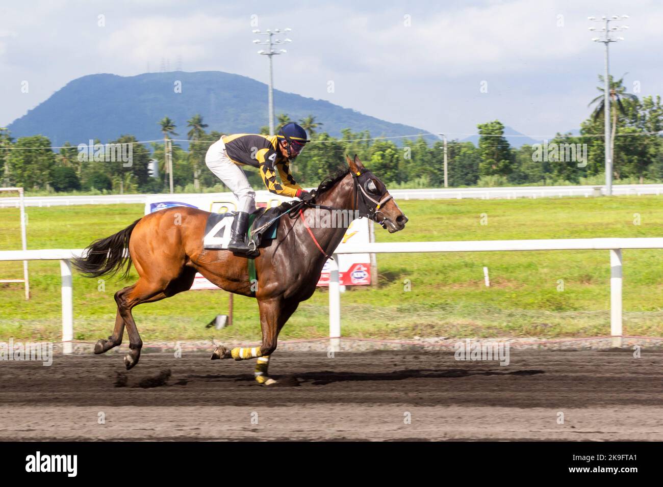 Horse racing at the Metroturf hippodrome in Tanauan, Batangas ...