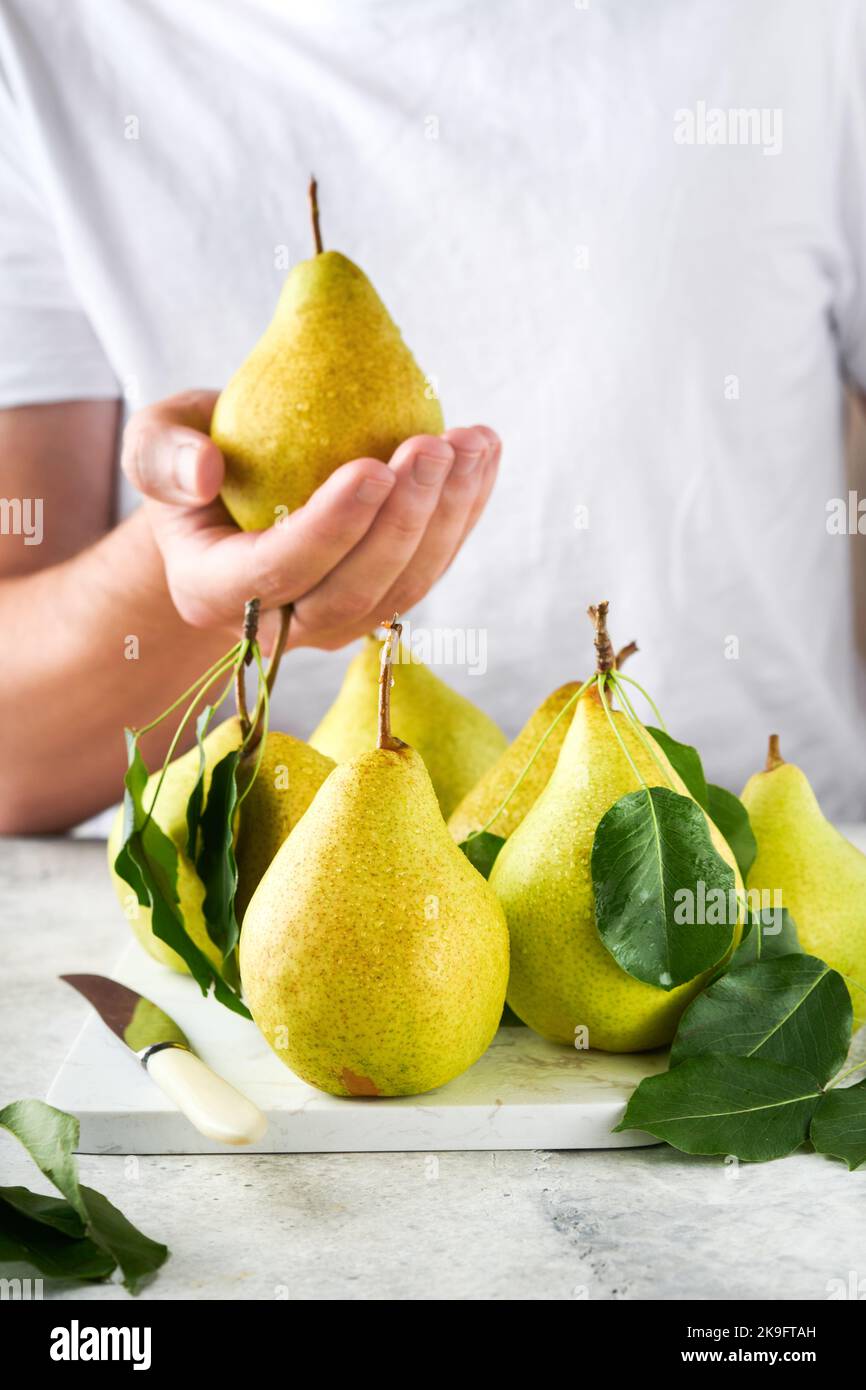 Pears. Fresh sweet organic pears with leaves on stand or plate and in ...