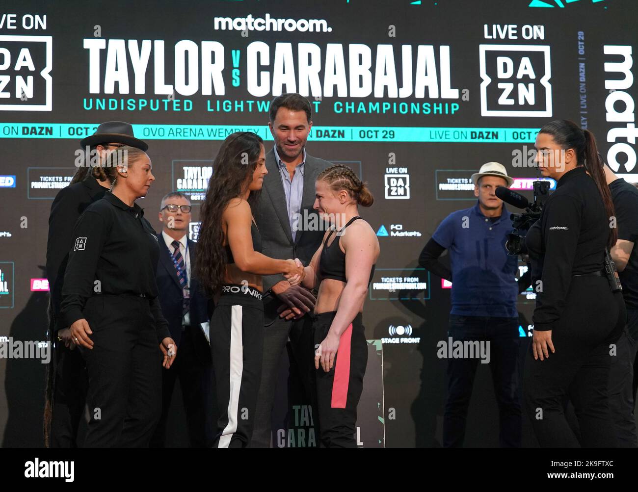 Maisey Rose Courtney (left) and Judit Hachbold during the weigh-in at ...