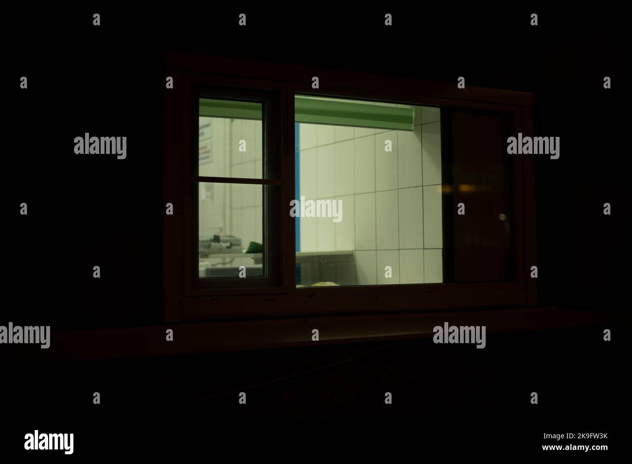Window in building. Single window. Light in dark interior. Glass in ...