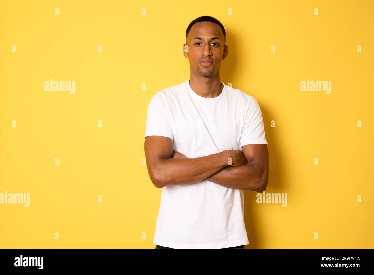 Portrait of attractive cheerful guy folded arms copy space isolated ...