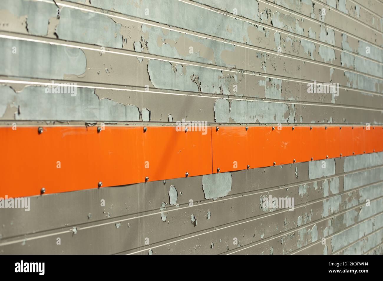 Old wall with orange stripe. Details of building. Surface texture ...