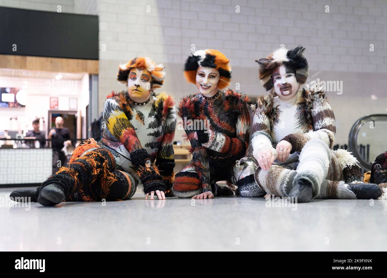 People dressed as cats during MCM Comic Con at the ExCel London in east ...