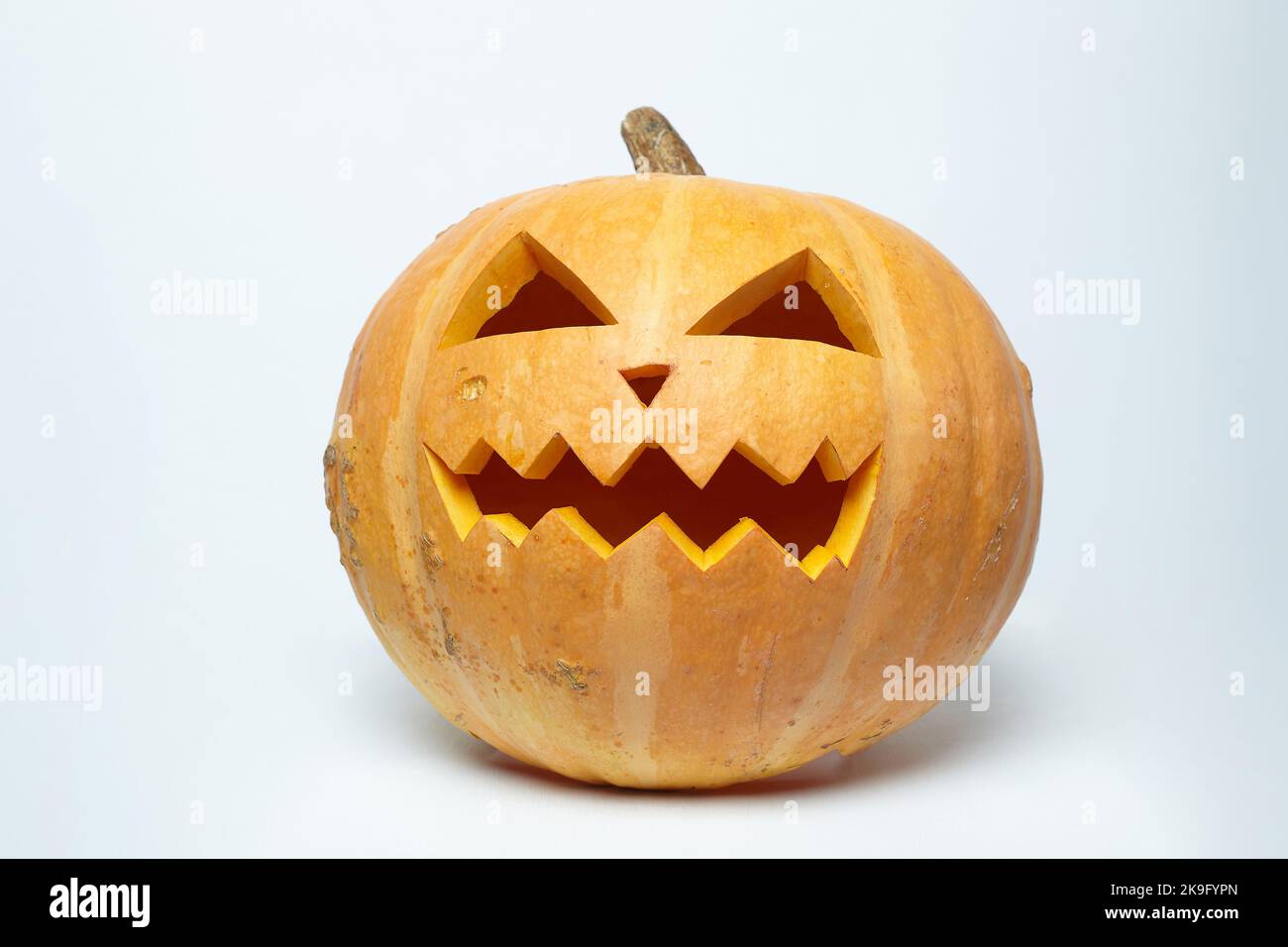 Jack's evil lantern, carved from a pumpkin with an aggressive grimace ...