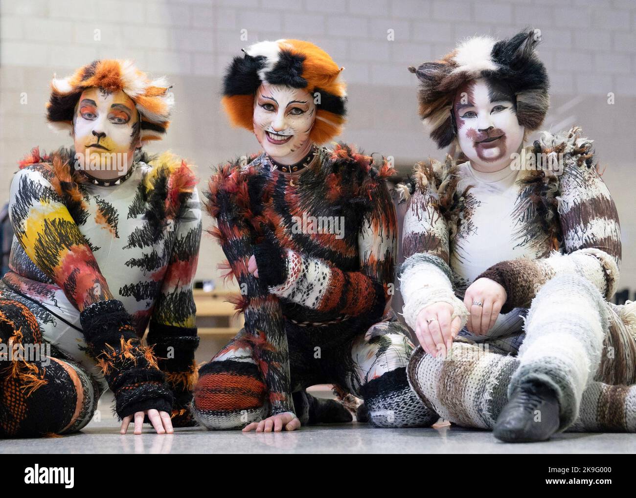 People dressed as cats during MCM Comic Con at the ExCel London in east ...