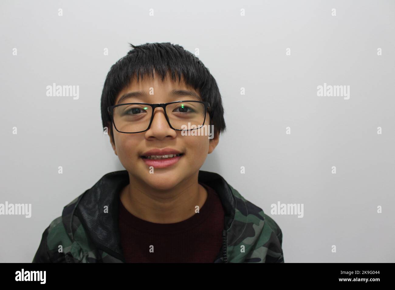 Boy wearing prescription glasses hi-res stock photography and images ...