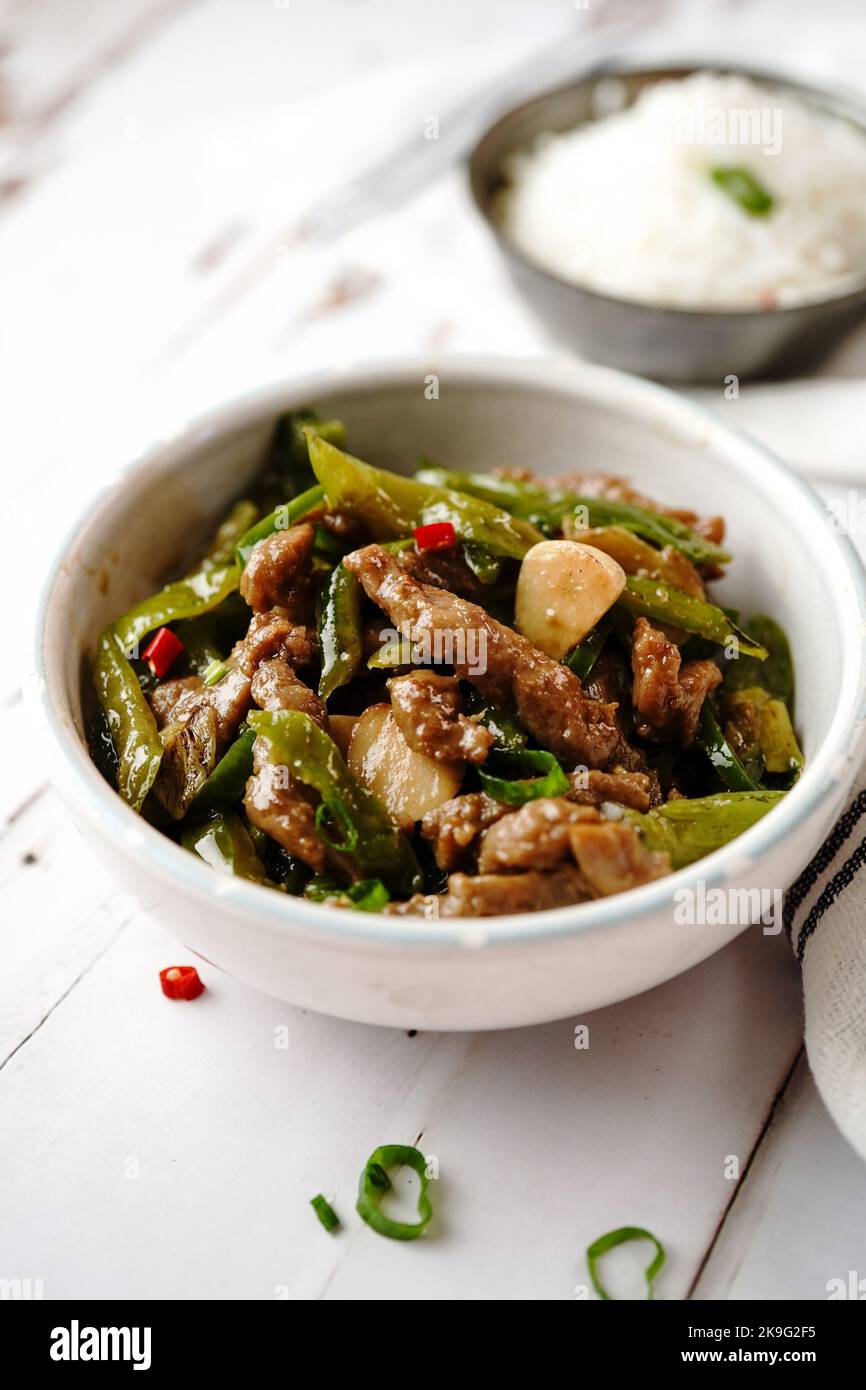 Asian style beef strips pepper stir fry, selective focus Stock Photo ...