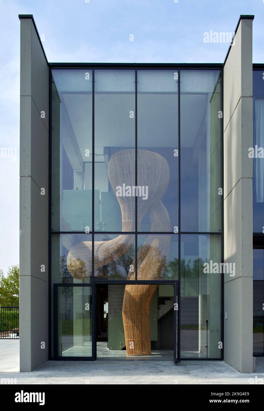 Factory entrance with curvaceous Rattan installation. Ice Ball Factory ...