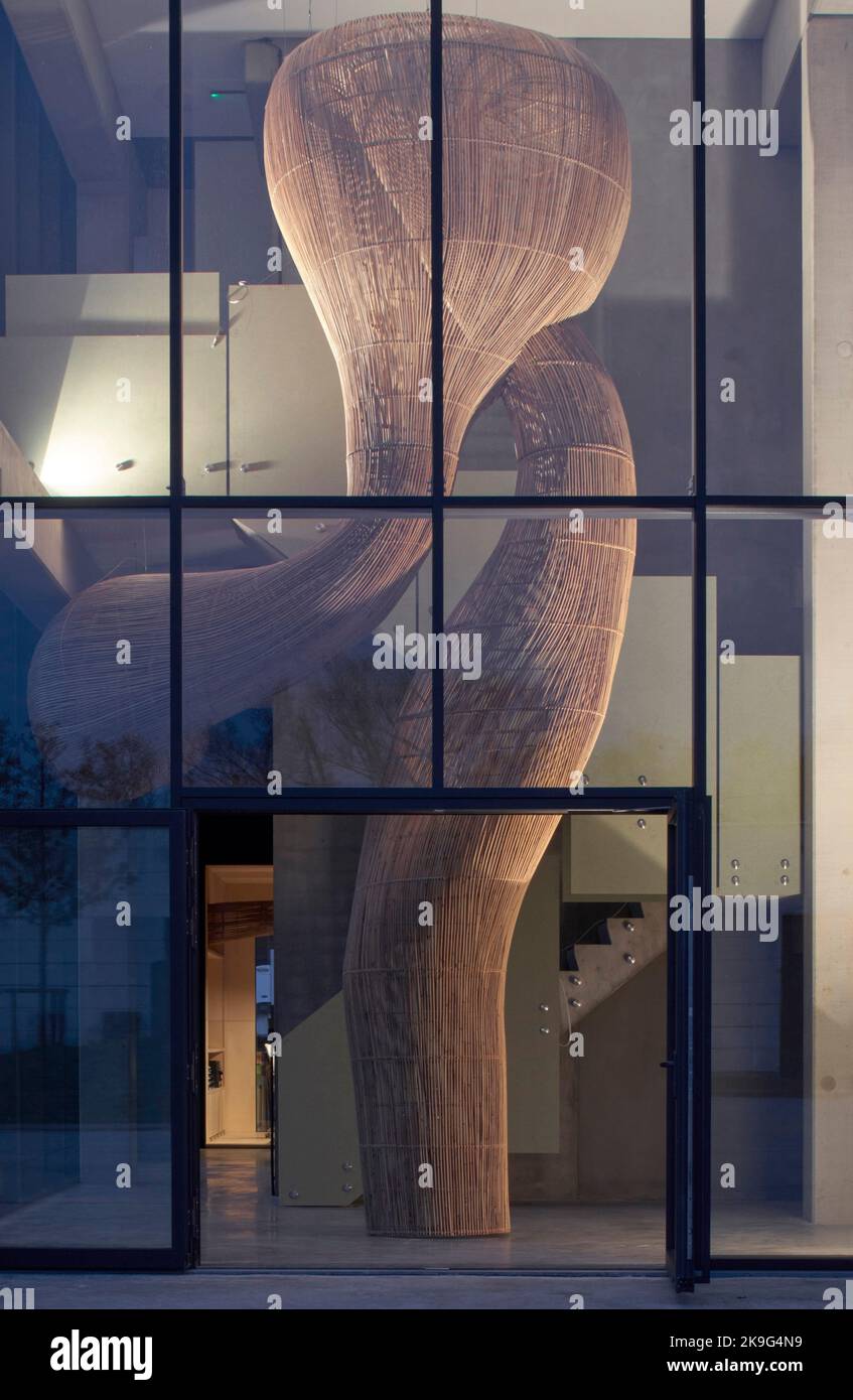 Factory entrance with curvaceous Rattan installation. Ice Ball Factory ...