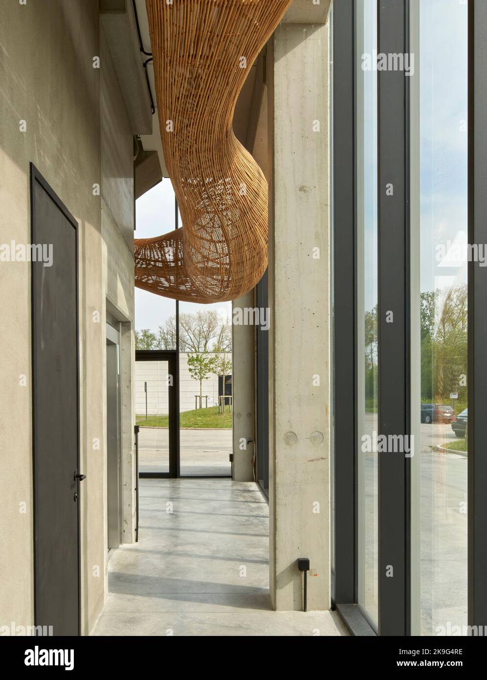 Factory entrance with curvaceous Rattan installation. Ice Ball Factory ...