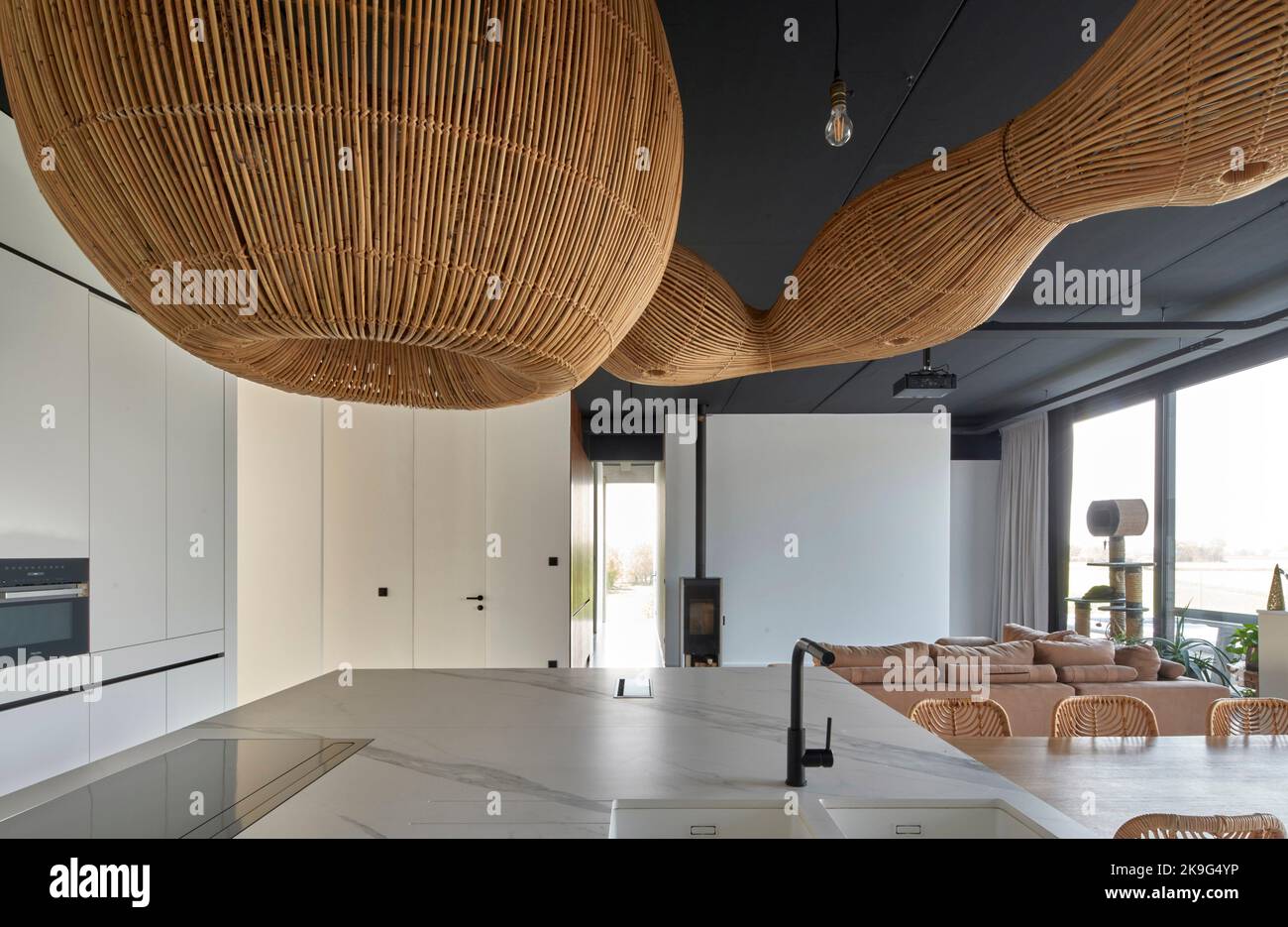 Upper level flat with curvaceous Rattan installation. Ice Ball Factory ...