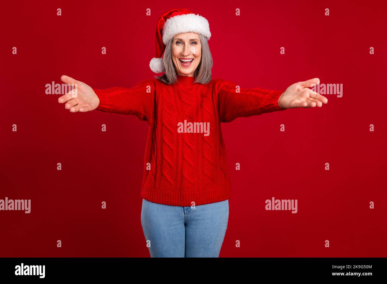 Photo of positive amazed grandma stretch hands ask cuddle wear hat ...
