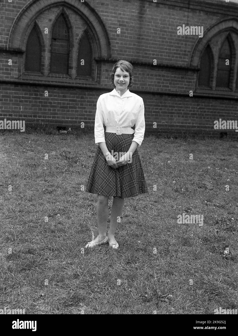 1962, historical, May Day, Leeds, England, UK, a teenage girl wearing a ...
