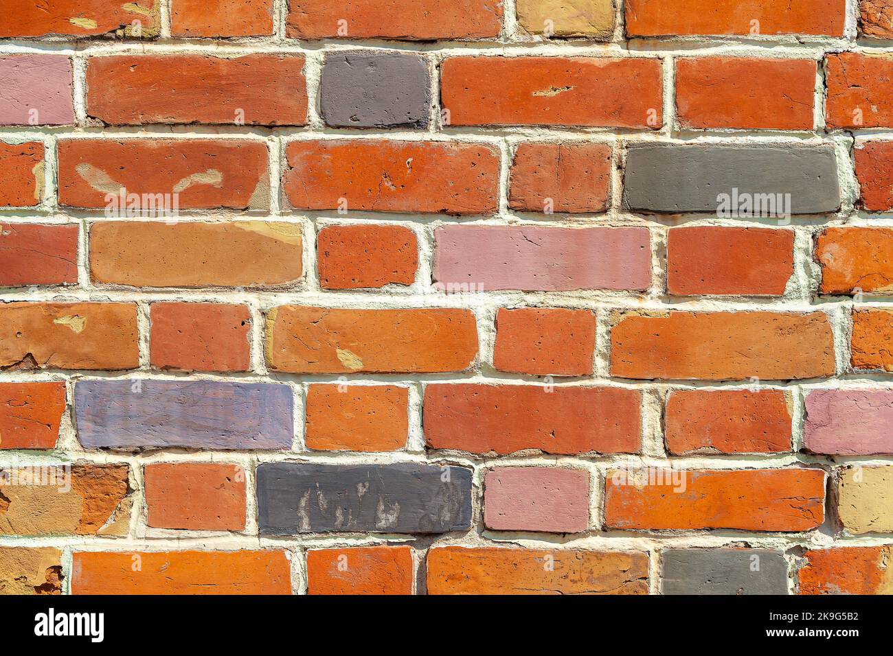 Multicolor brick wall texture background Stock Photo - Alamy
