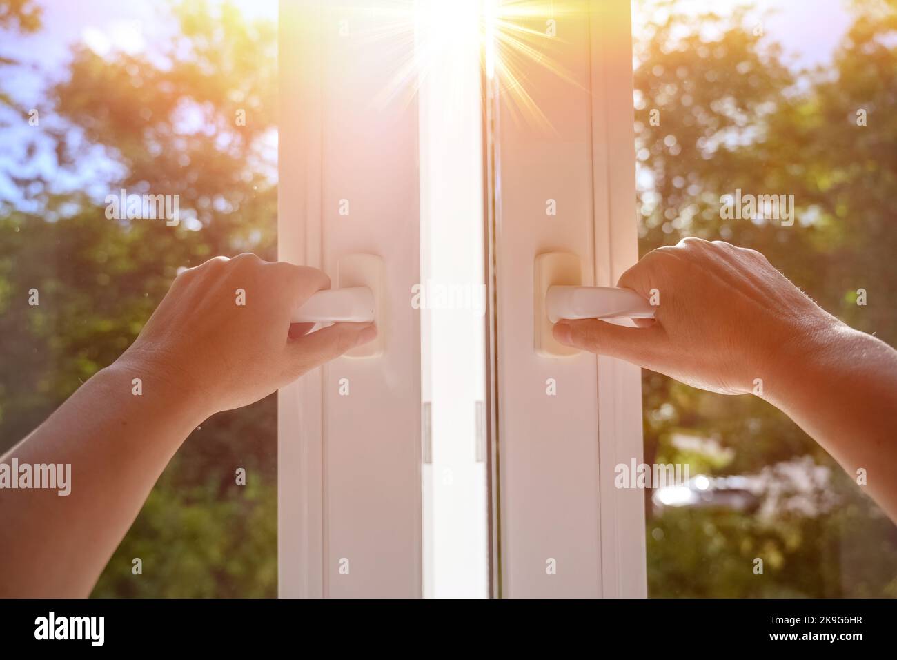 Man opening a window home hi-res stock photography and images - Alamy